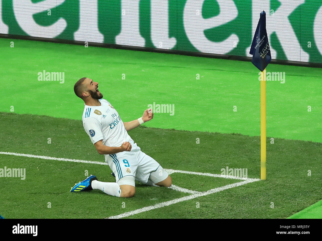 Real Madrid's Karim Benzema celebrates scoring his side's first goal of ...