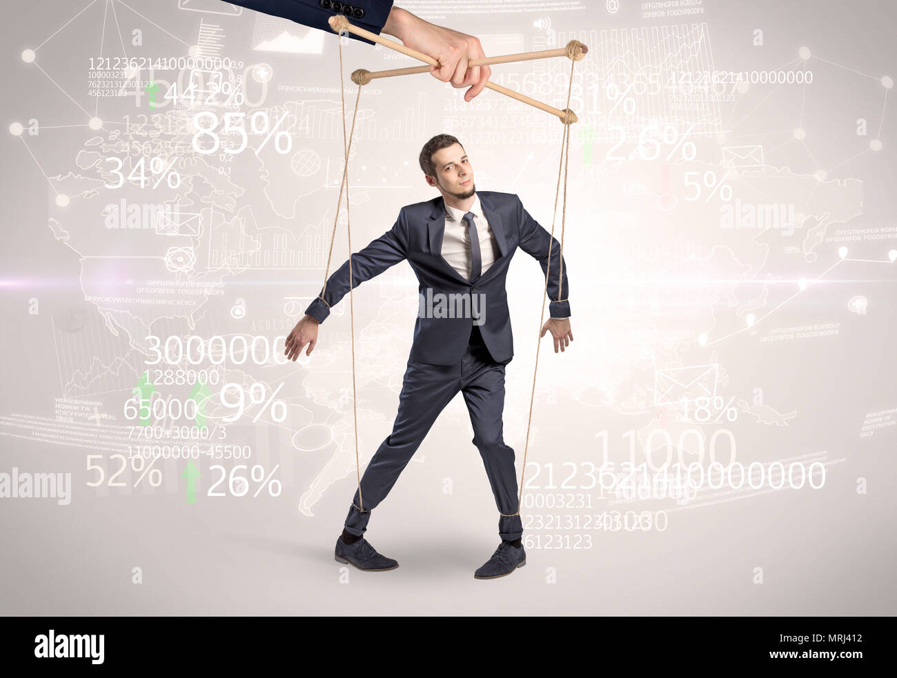 Puppet businessman controlled by another hand with financial concept ...