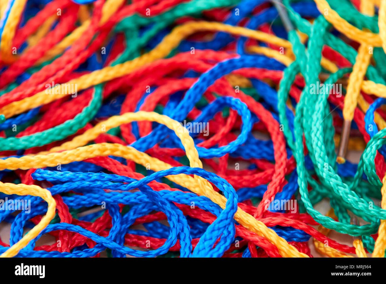 Set of colorful strings for school crafts Stock Photo - Alamy