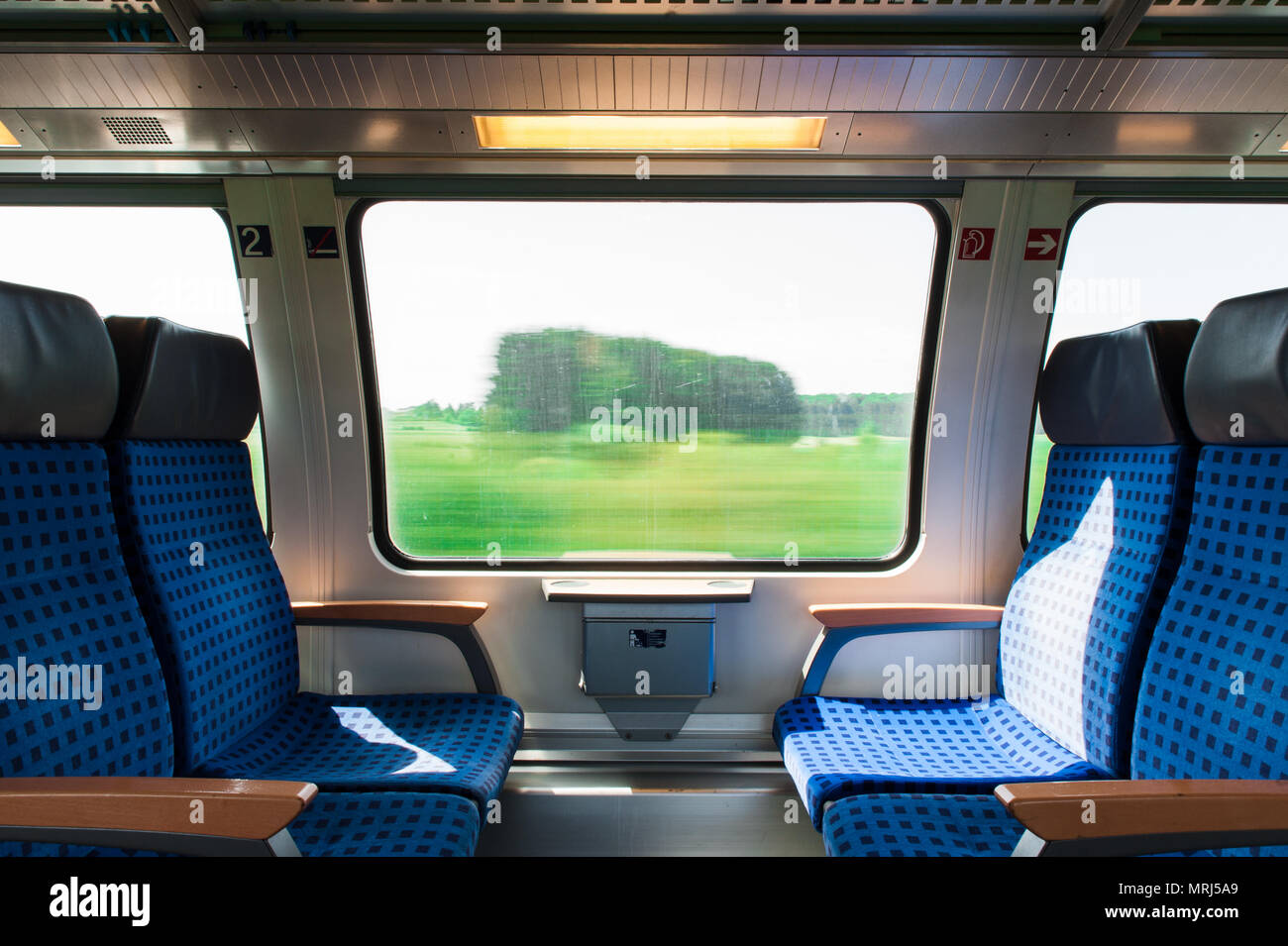 Motion field and trees scene from the train's window Stock Photo - Alamy