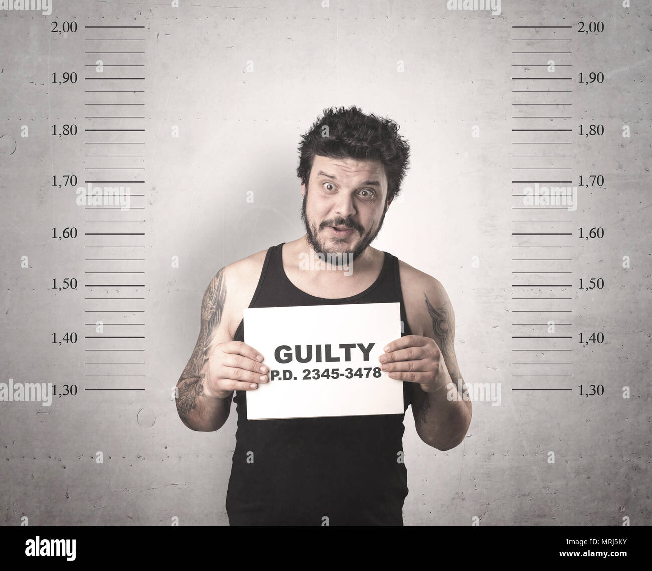 Caught guilty man with ID signs on his hand Stock Photo - Alamy