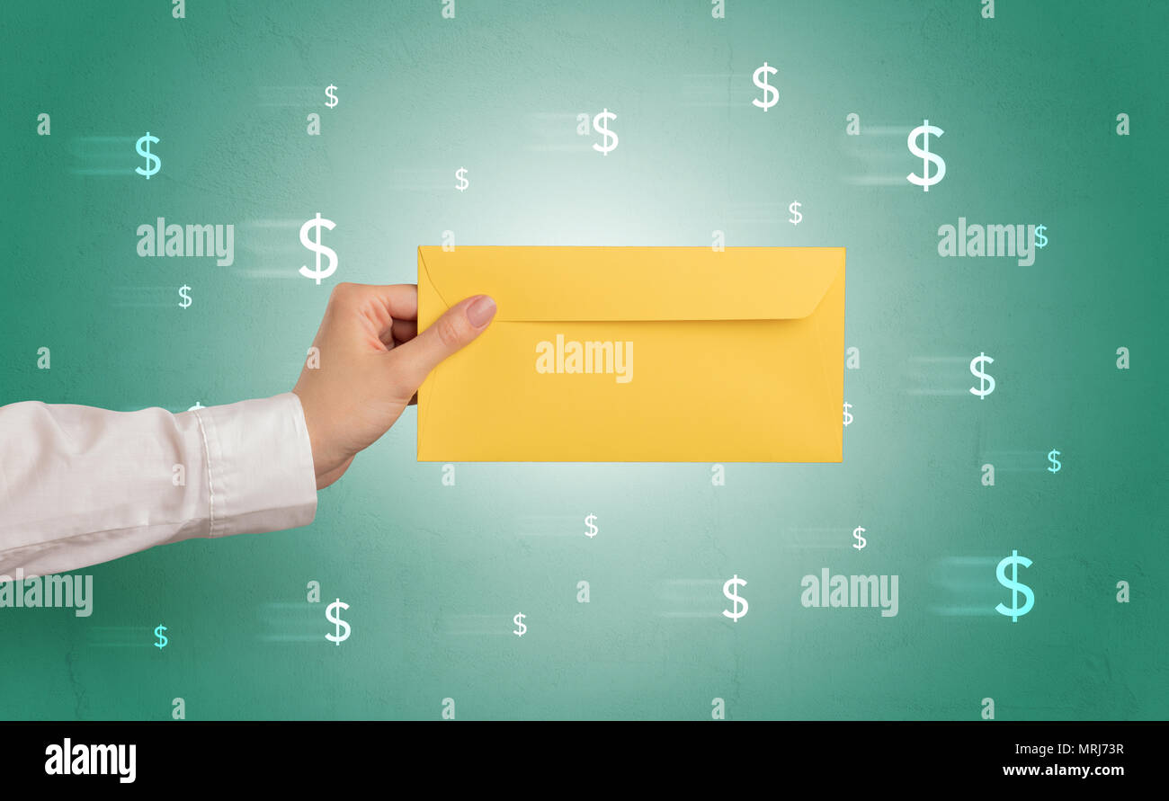 Female hand holding empty and full envelope with green background and ...