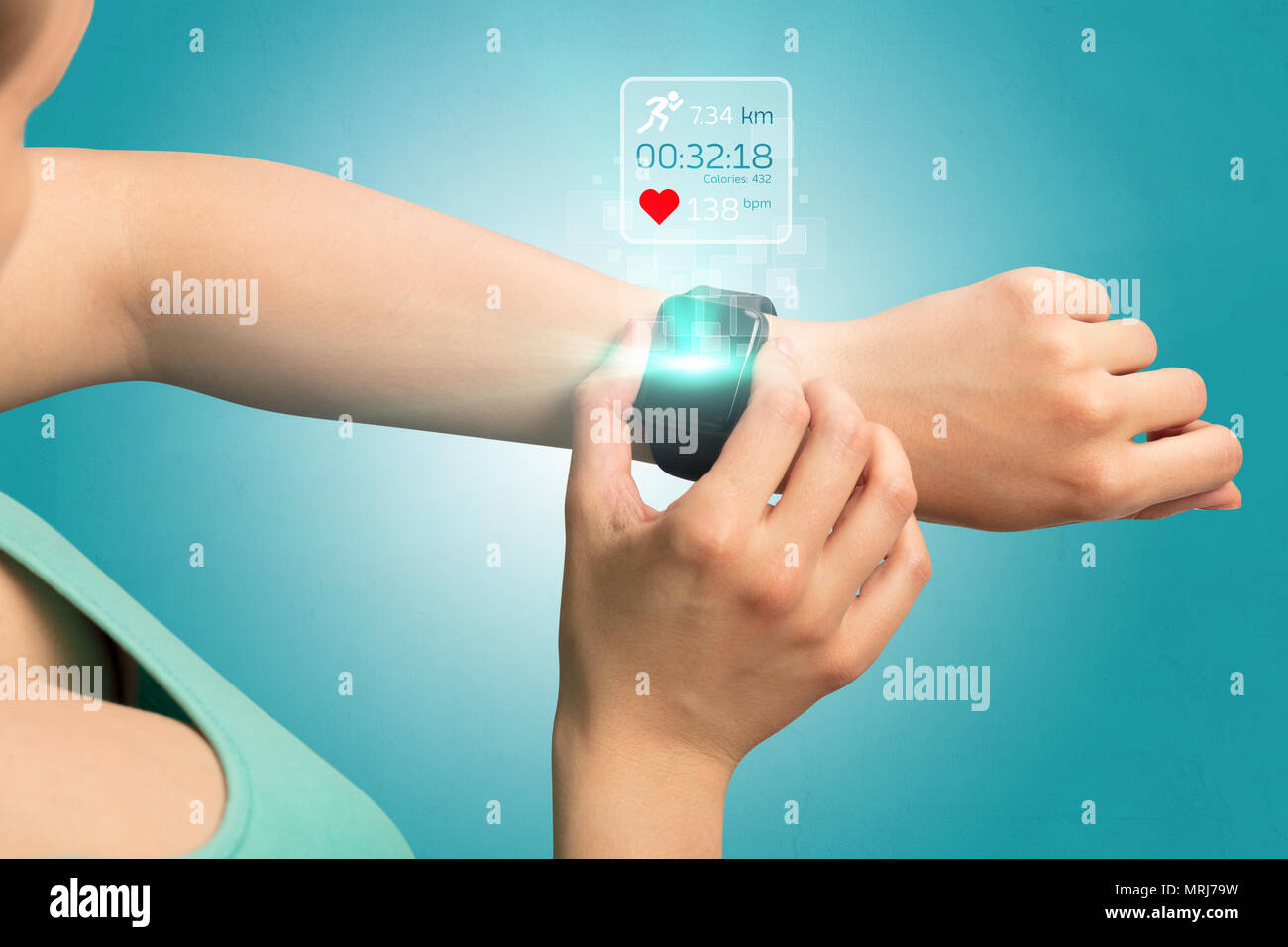 Female hand with smartwatch and running concept above Stock Photo - Alamy