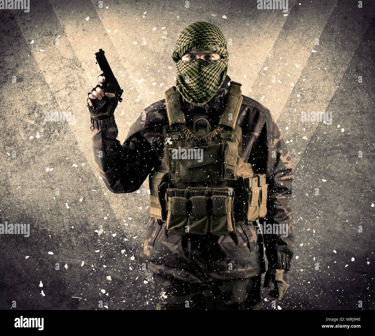 Portrait of a dangerous masked armed soldier with grungy light ...