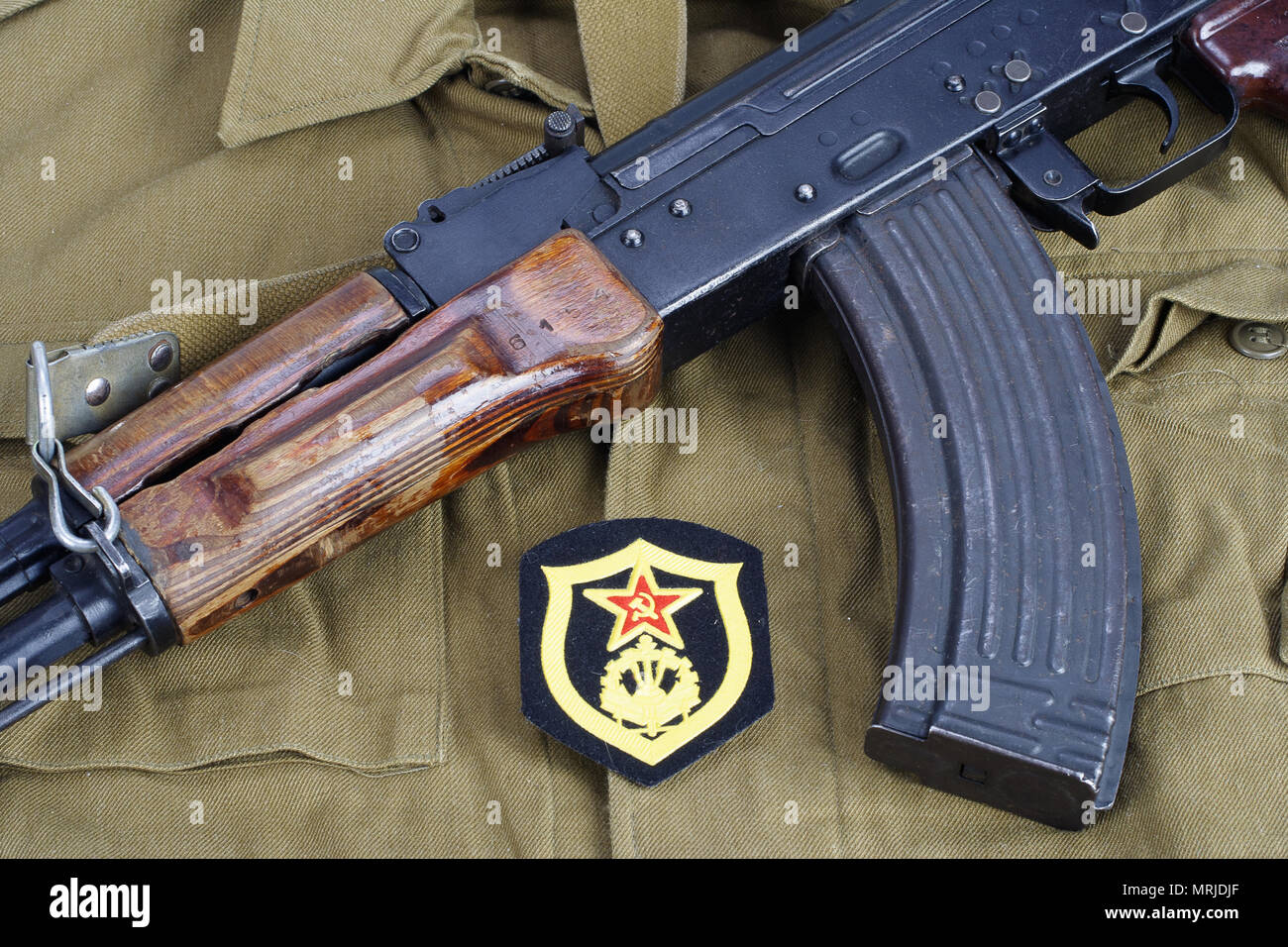AK47 with Soviet Army Combat engineer shoulder patch on khaki uniform ...