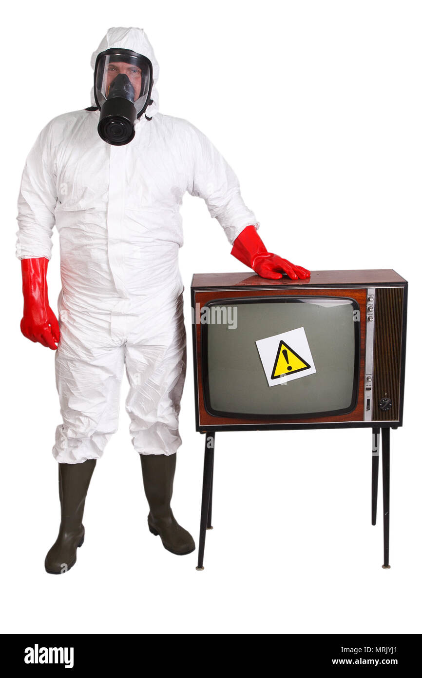 Man in protective suit with retro TV set isolated on white Stock Photo ...