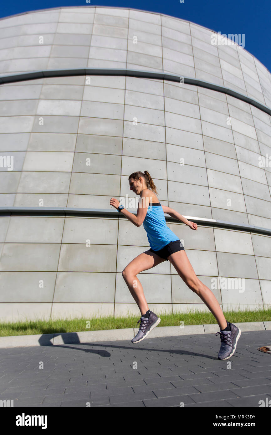 Athlete woman urban runner Stock Photo - Alamy