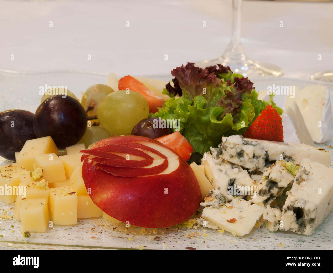 Selection of cheeses with nuts and fruit Stock Photo - Alamy