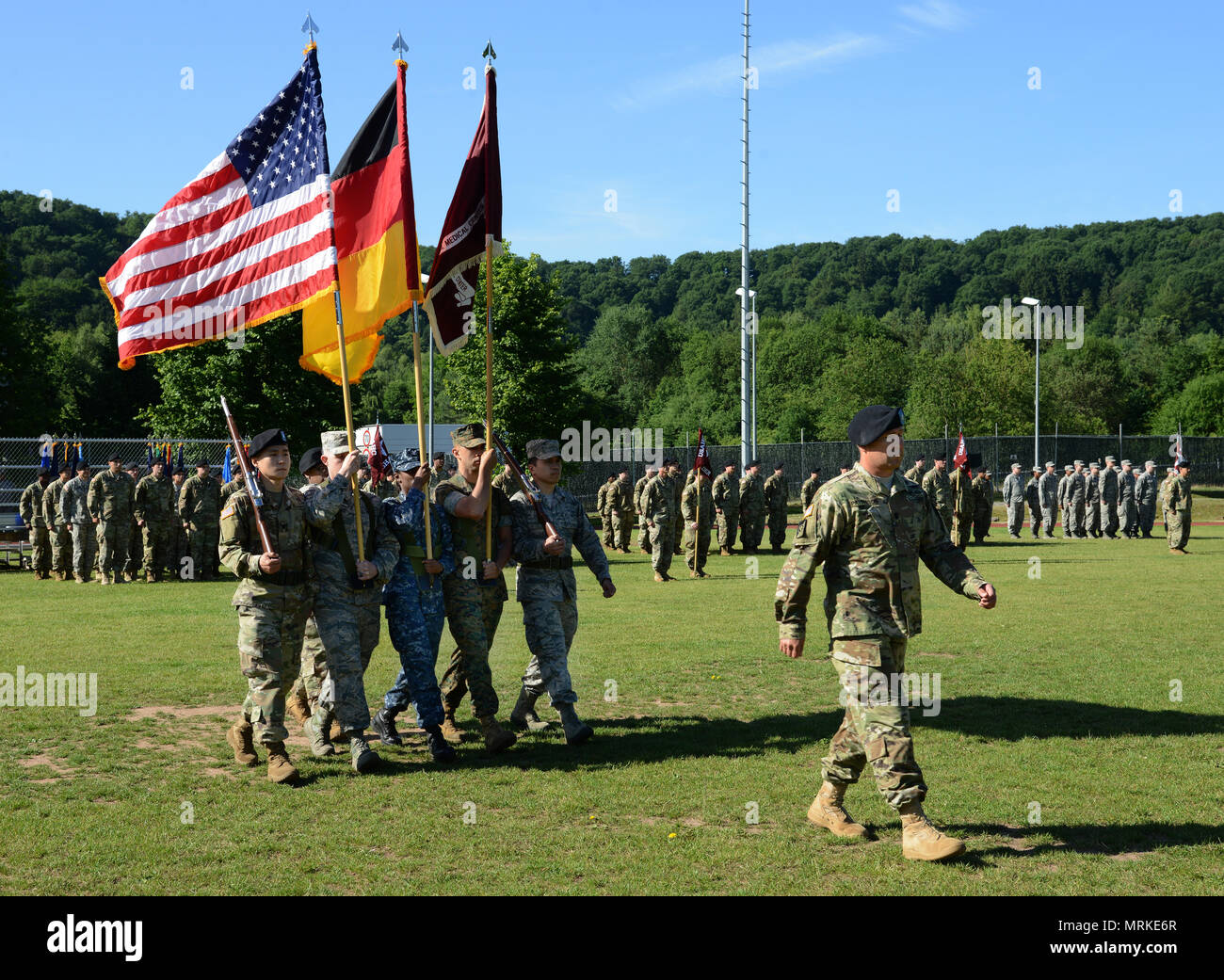 Lt. Col. Kyle Patterson, commander of troops leads the Color Guard ...