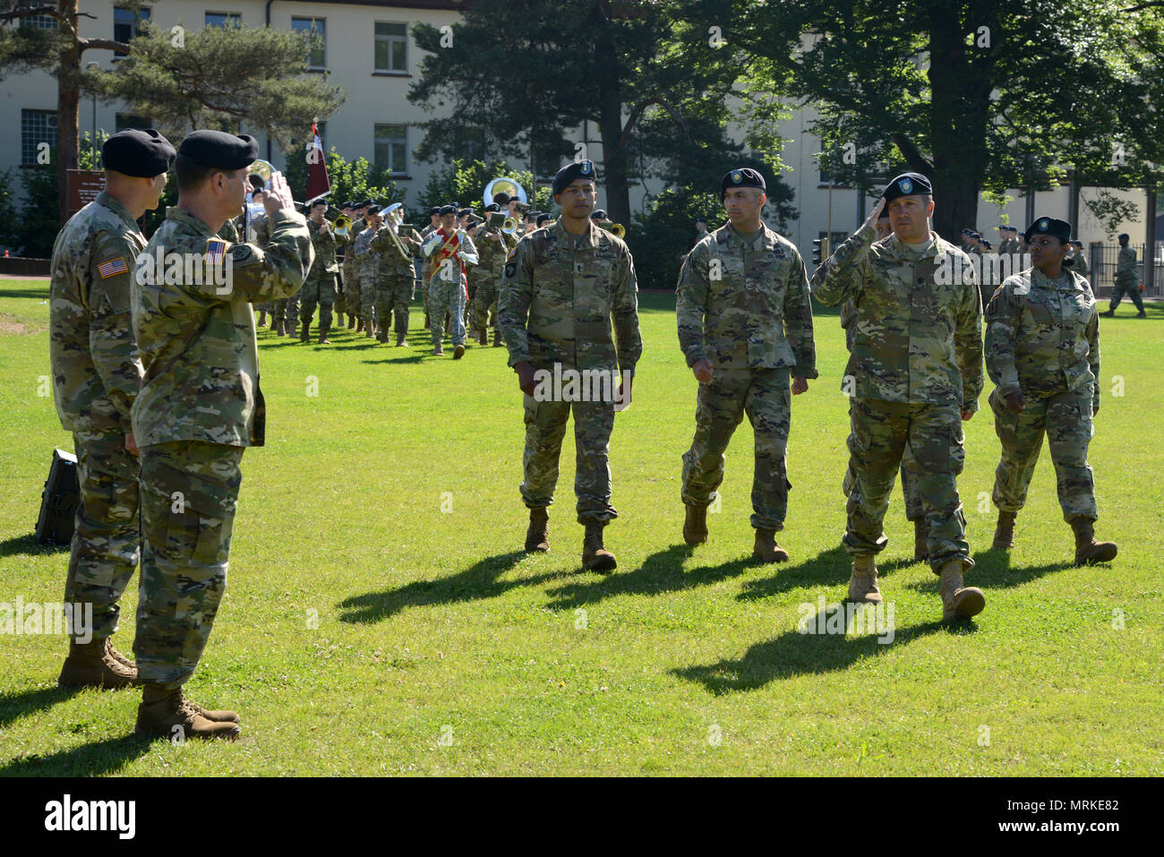 Lt. Col. Kyle Patterson, commander of troops salutes during pass in ...
