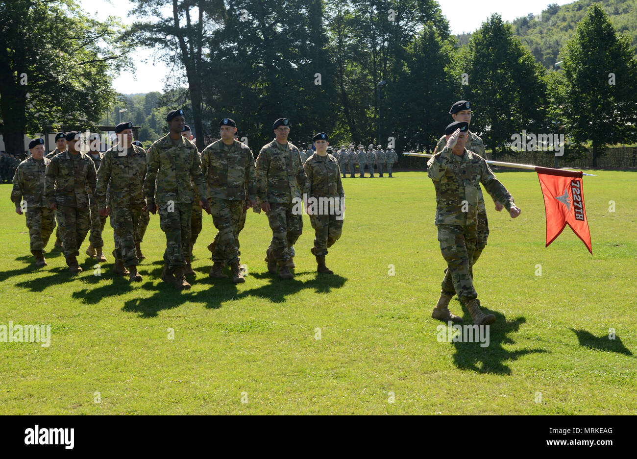Lt. Col. Aaron Neal, commander, 7227th Medical Support Unit, presents ...