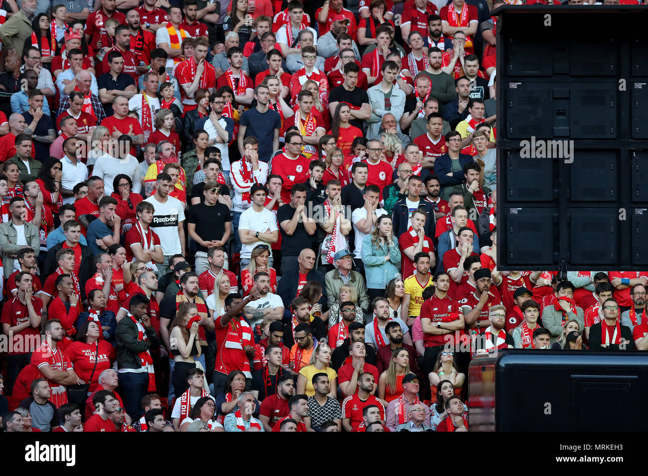 Liverpool fans react as they watch the UEFA Champions League Final ...