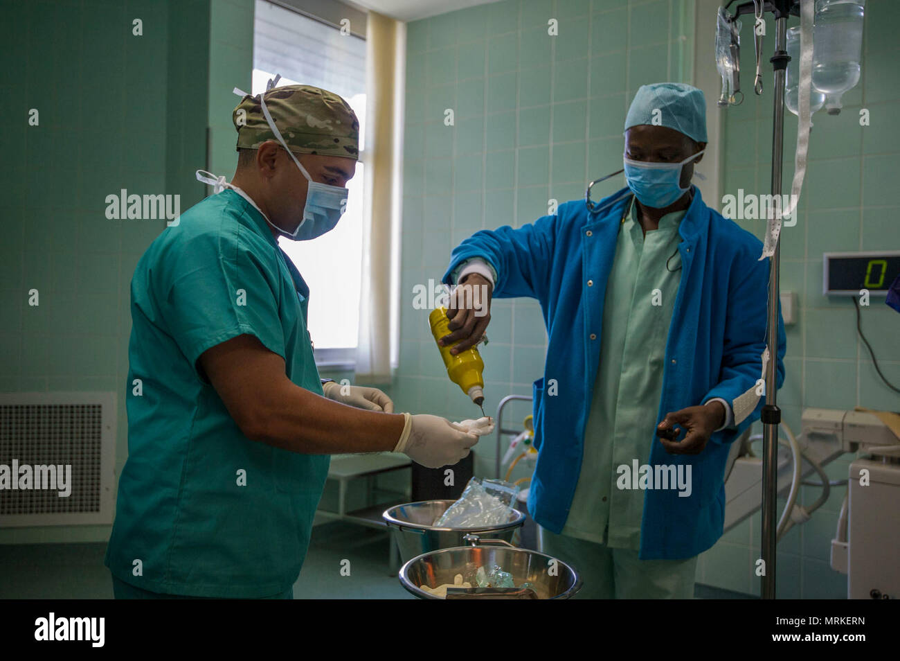 U.S. Army Maj. Fernando Lopez, a nurse anesthetist, prepares to ...