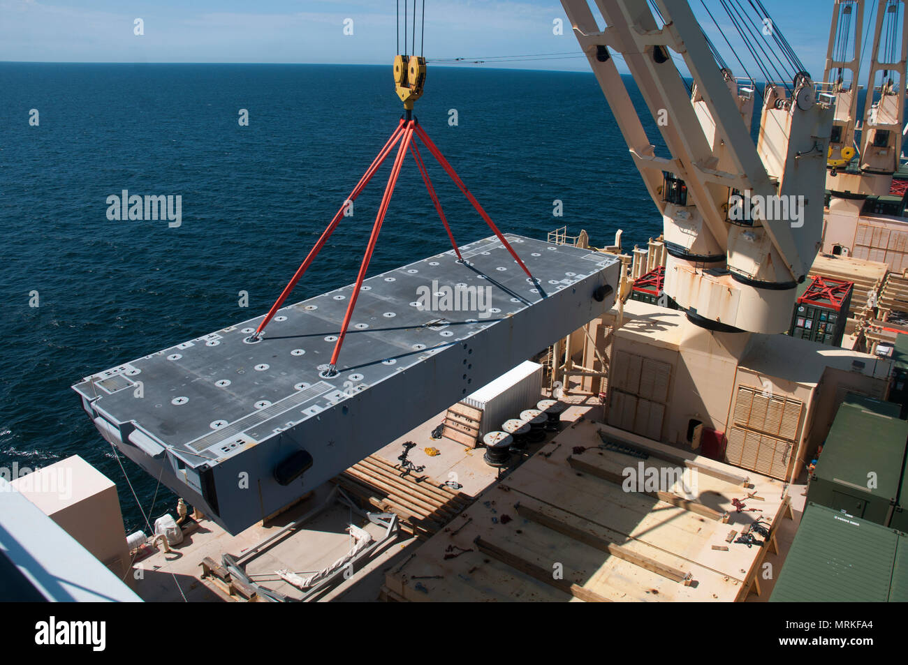 VENTSPILS, Latvia – Sailors from Navy Cargo Handling Battalion One lift ...