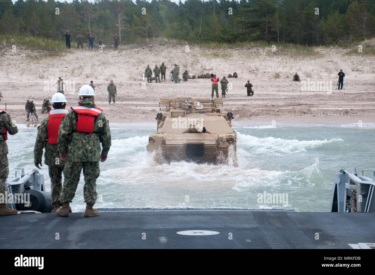 VENSPILS, Latvia – Sailors from Naval Beach Group TWO offload a USMC ...