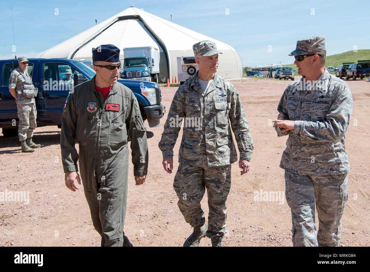 Lt. Col. Michael Lockette, a commander at the 233d Space Group, Greeley, Colo., gives a tour to ...