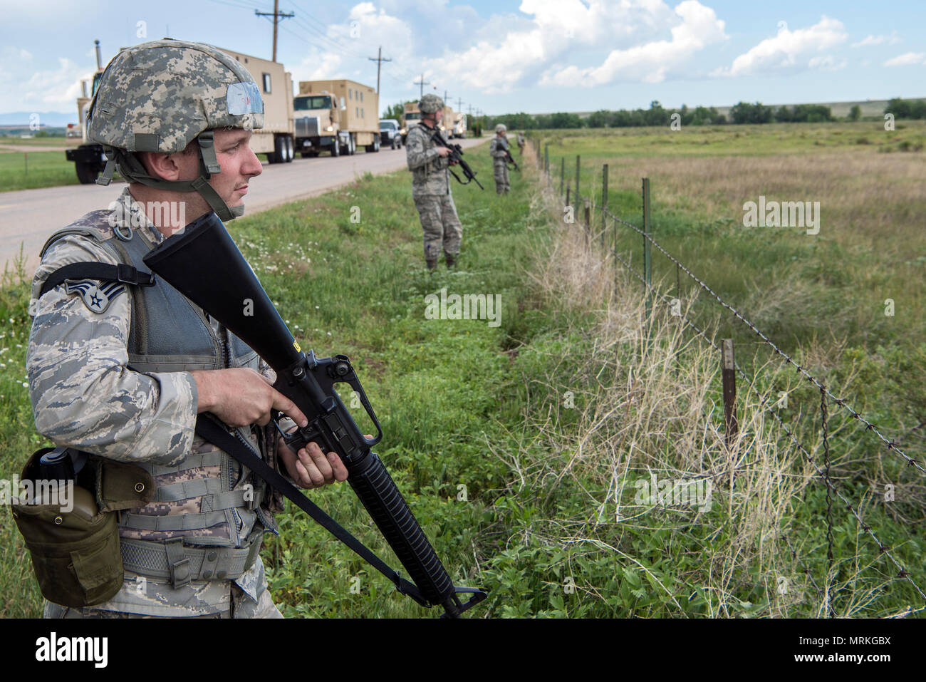 Airmen stand guard as the 233d Space Group from Greeley, Colorado ...