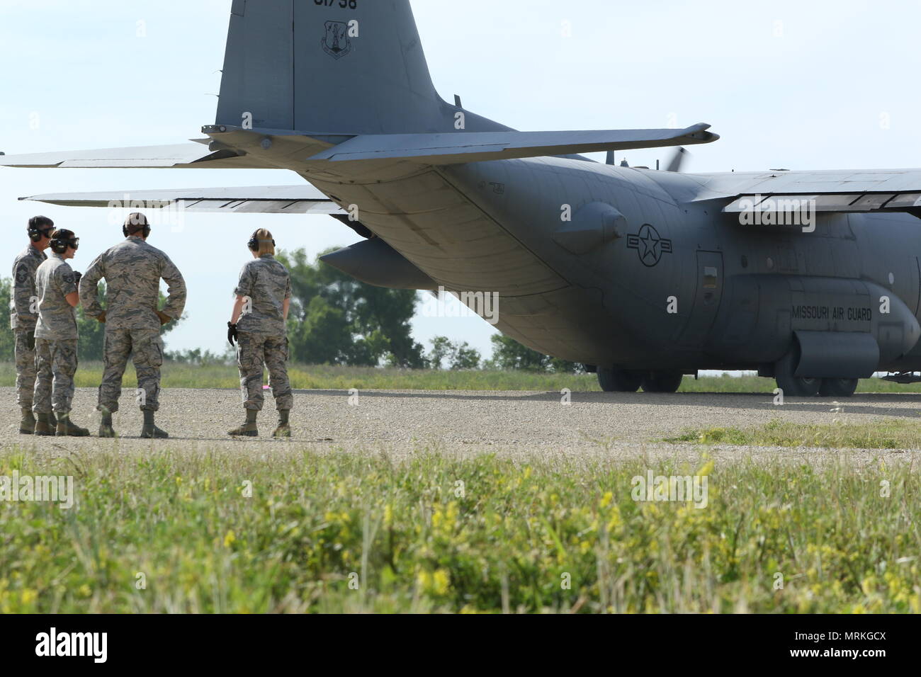 Airmen with the 139th Airlift Wing, stand by to assist the 130th Field ...