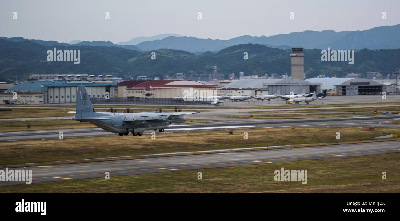 A U.S. Marine Corps KC-130J Hercules with Marine Aerial Refueler ...