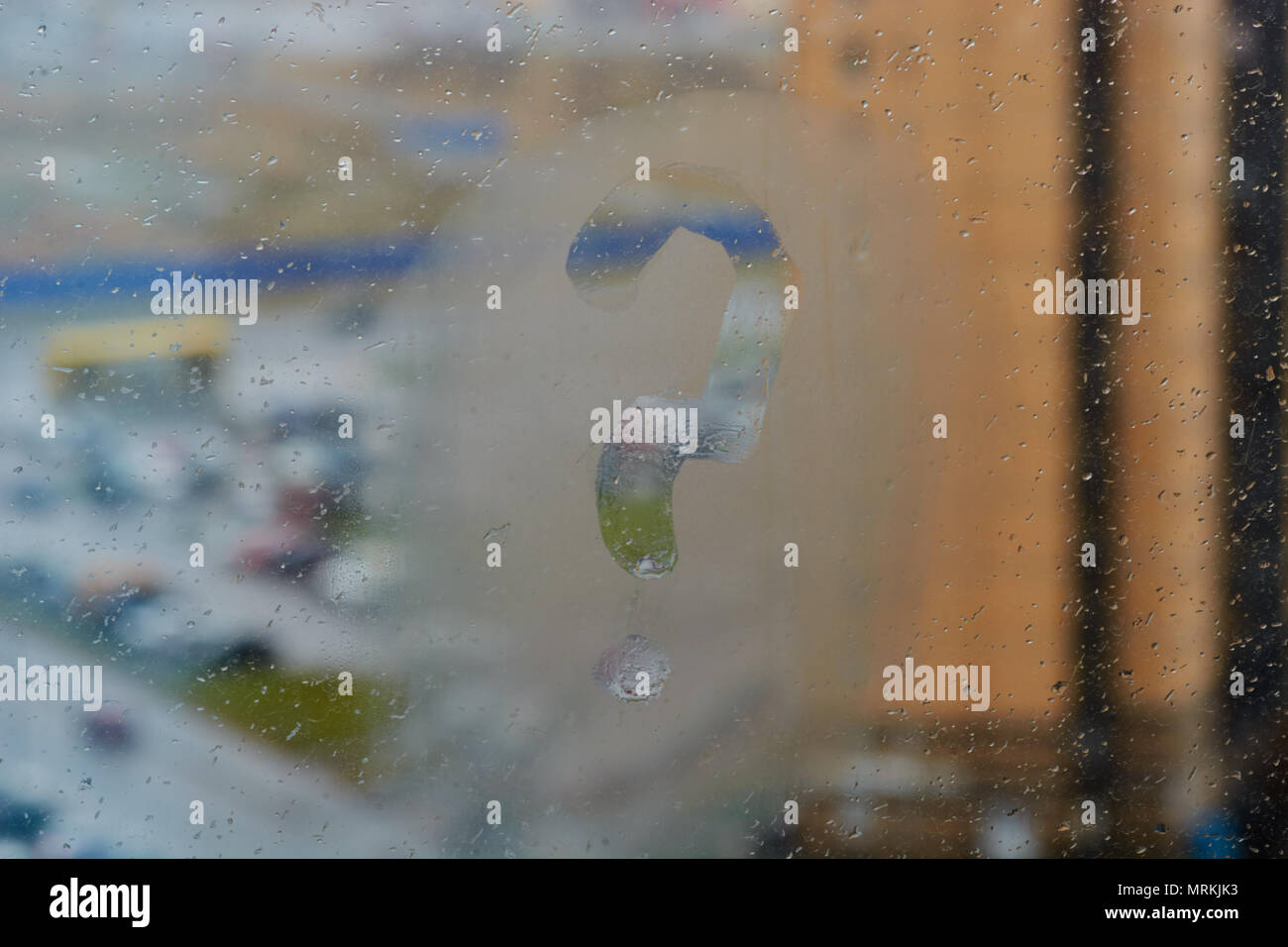 The QUESTION MARK ON the WINDOW the glass Windows in the city Stock ...