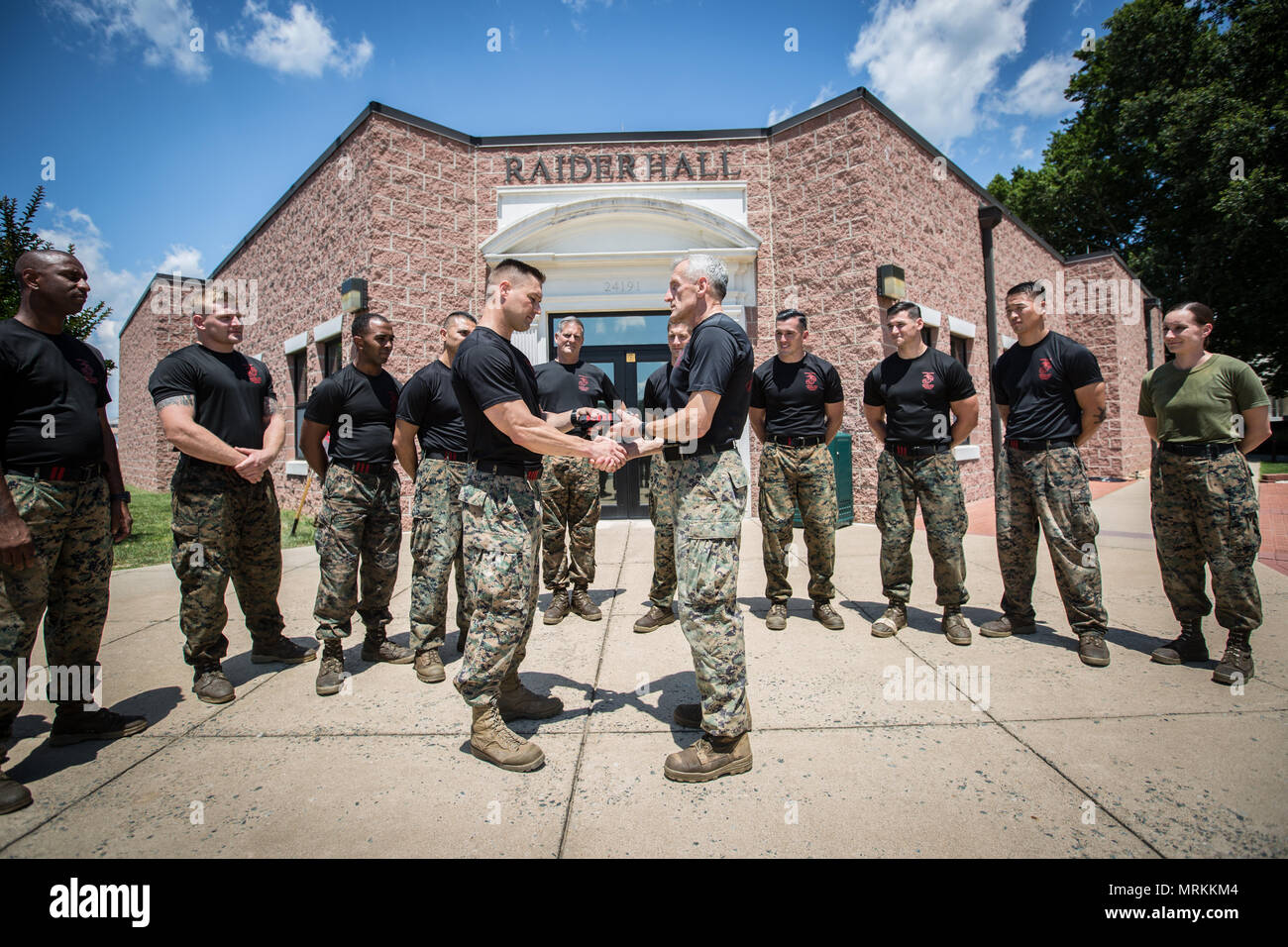 U.S. Marine Corps Second Lt. Mark Green (center, left) receives a fifth ...