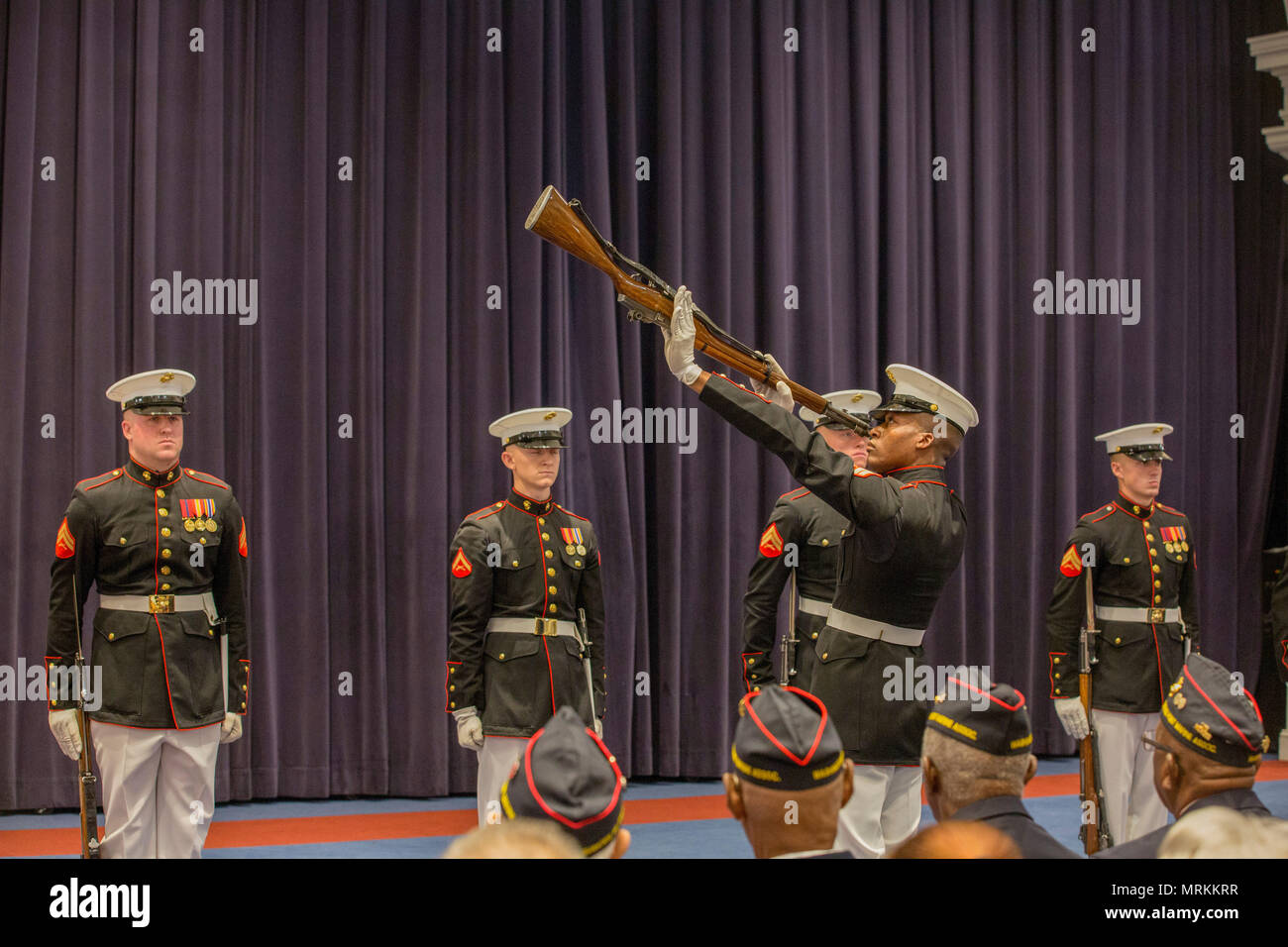 The Marine Corps Silent Drill Platoon performs during an evening parade ...