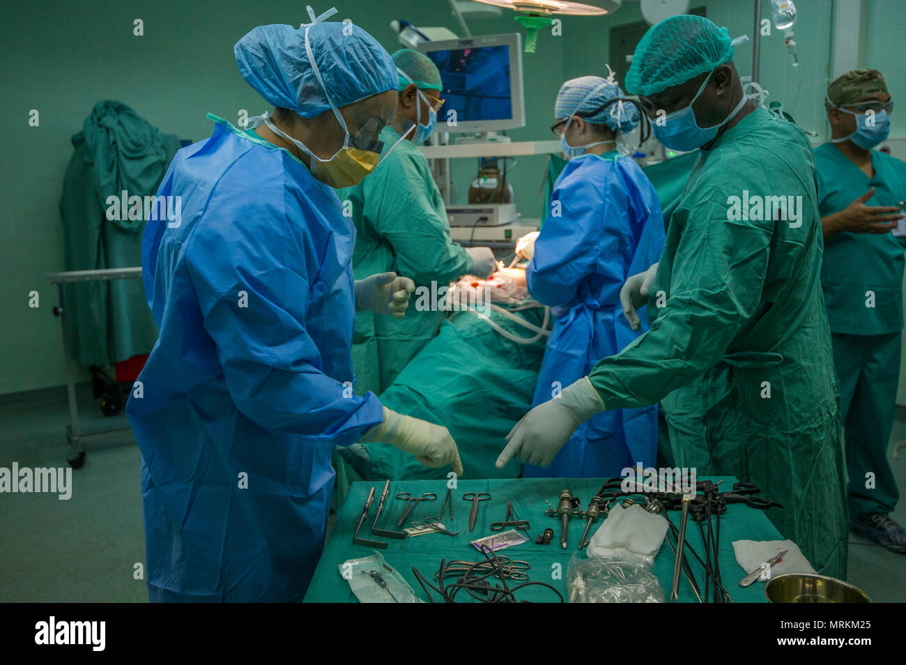 U.S. Army Staff Sgt. Jennifer Singh, an operating room technician ...
