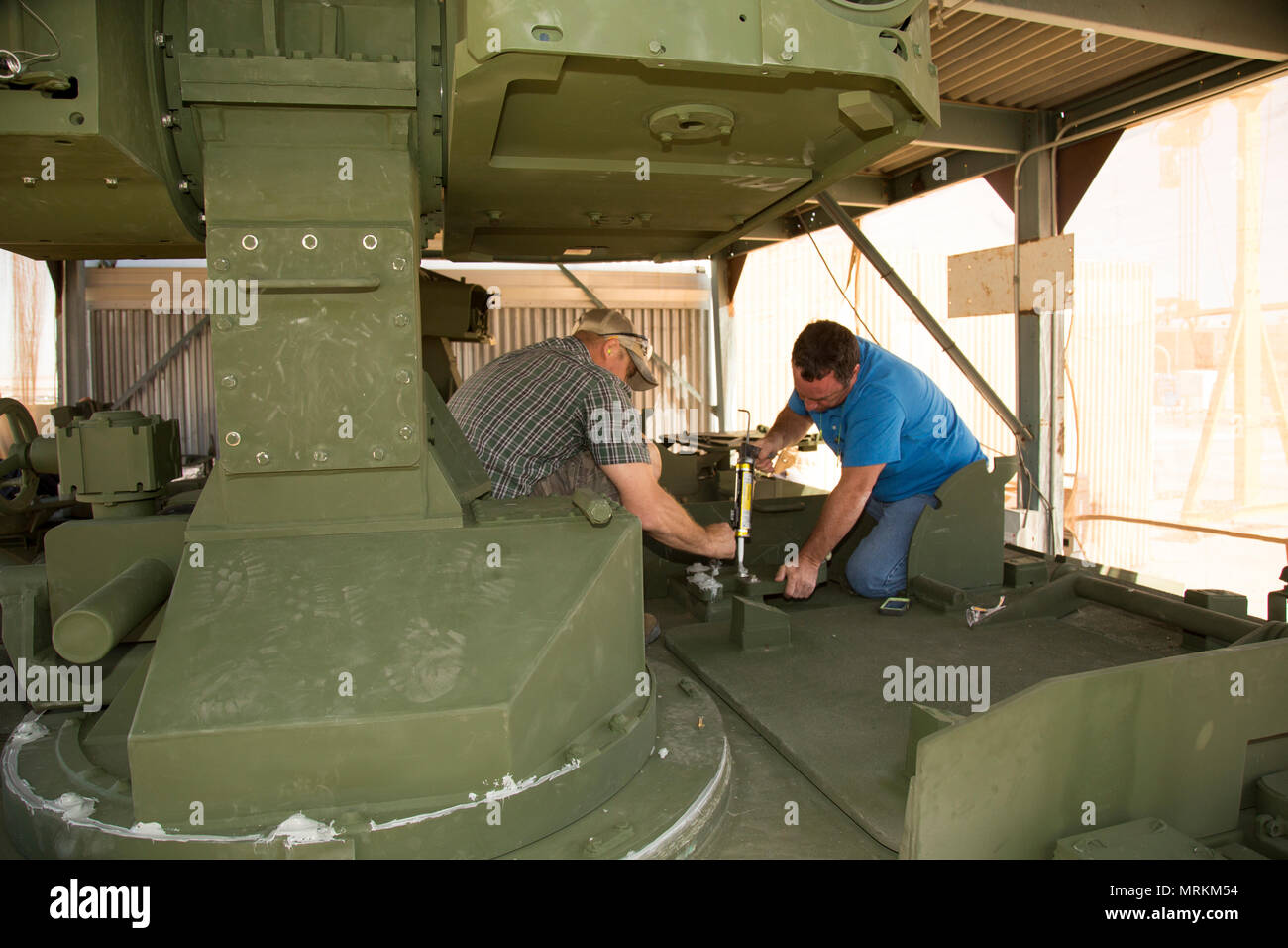 (Left) Heavy Equipment Mechanics Mack Brown and Patrick Jackett from ...