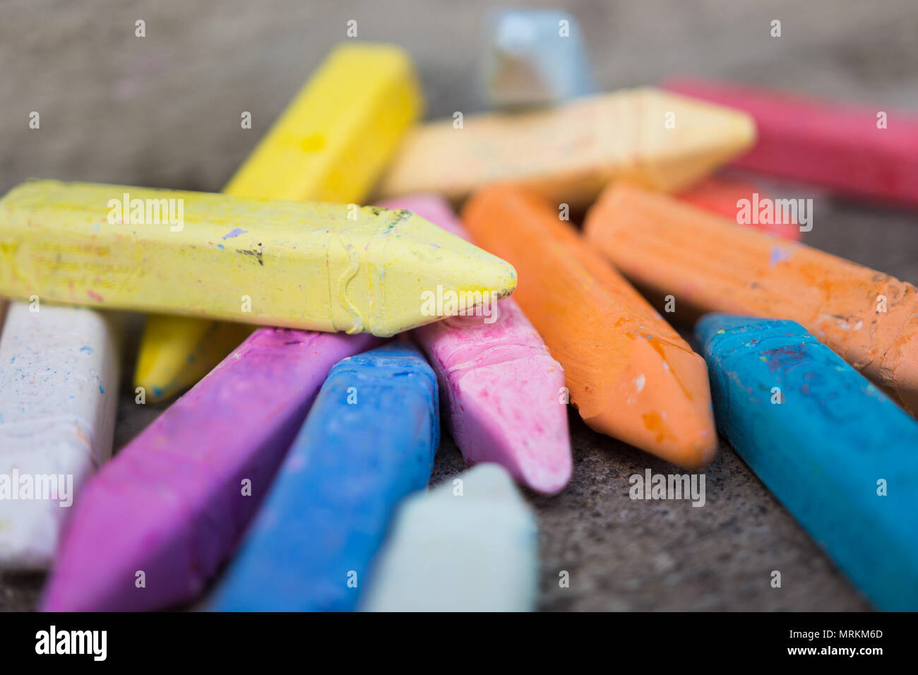Random stack of multicolored sidewalk chalk Stock Photo - Alamy
