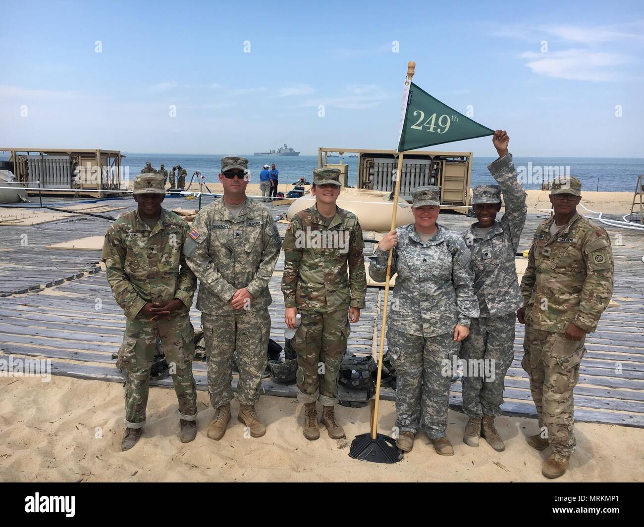 (Left to Right) SPC Jeanclimaque Augustin, SGT Christopher Holman, PFC ...