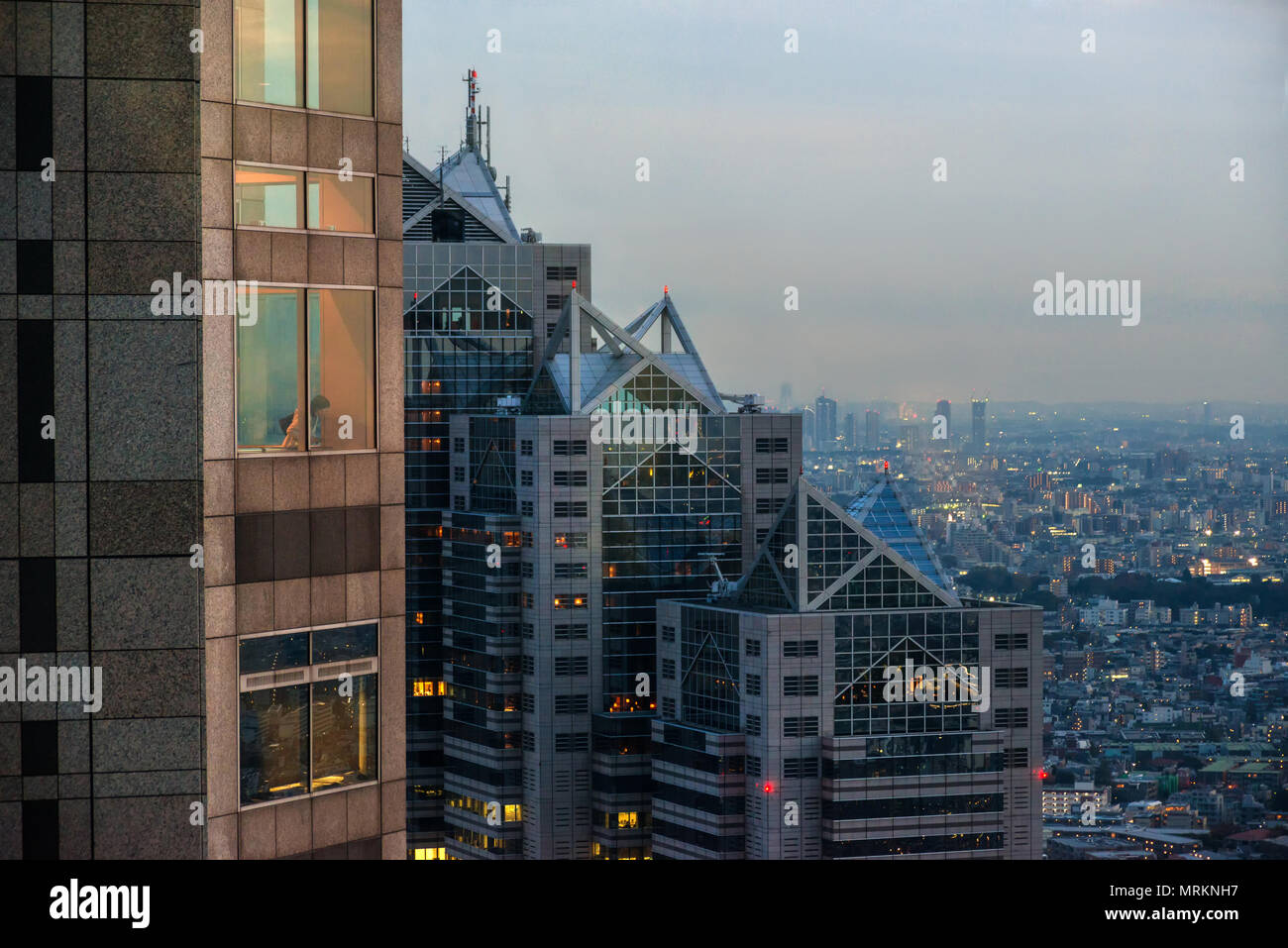 Tourist watch Shinjuku skyline with Park Hyatt Hotel skyscraper from ...