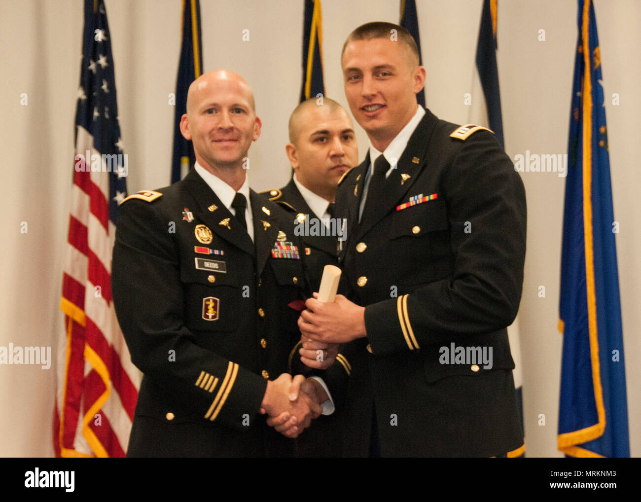 Capt. James Golder, native of Mason, Michigan, receives a diploma from ...