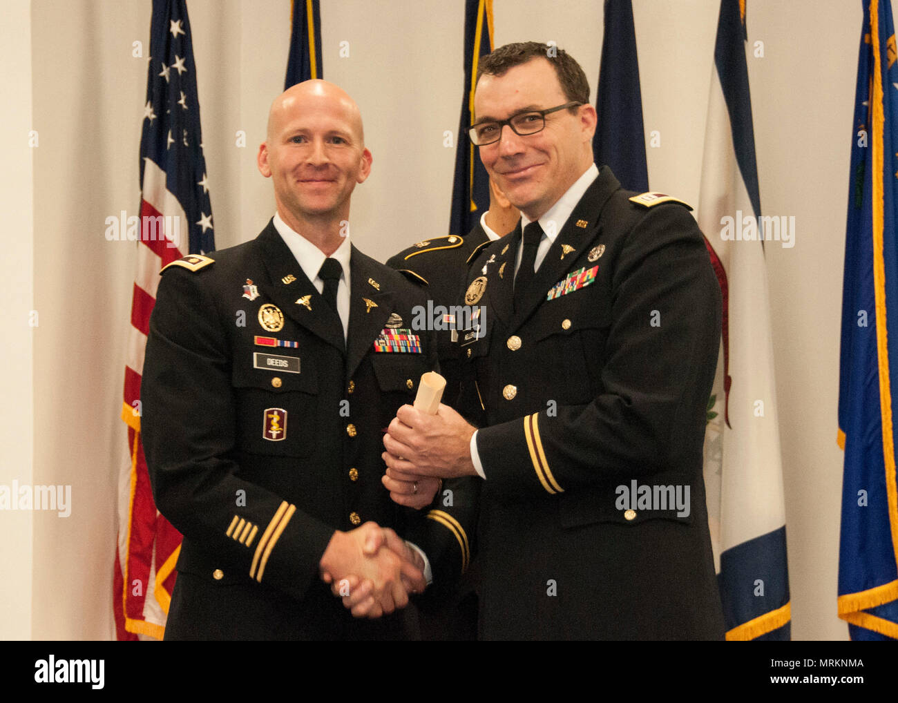 Capt. Brian Keller, native of St. Louis, receives a diploma from Maj ...