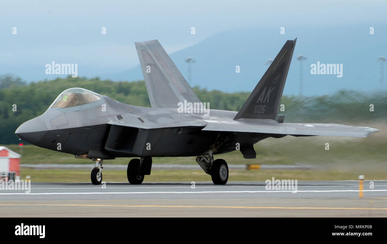 A U.S. Air Force F-22 Raptor, assigned to the 3rd Wing, takes off from ...