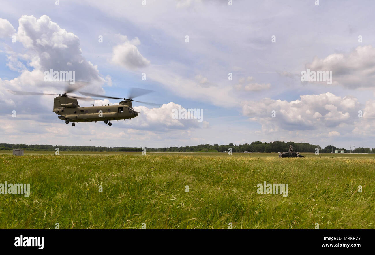 CH-47 Chinook is a tandem-rotor heavy-lift helicopter manufactured by ...