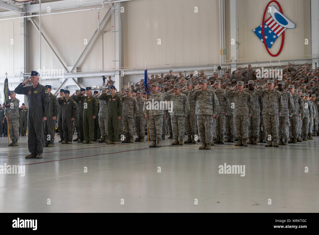 U.S. Air Force Airmen assigned to the 1st Fighter Wing stand in ...