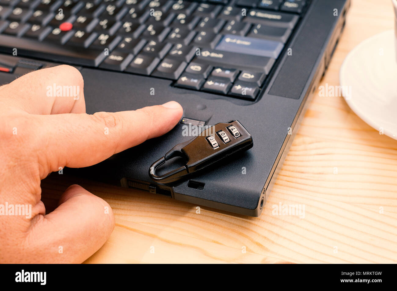Log in to account security concept. Laptop fingerprint reader and code ...