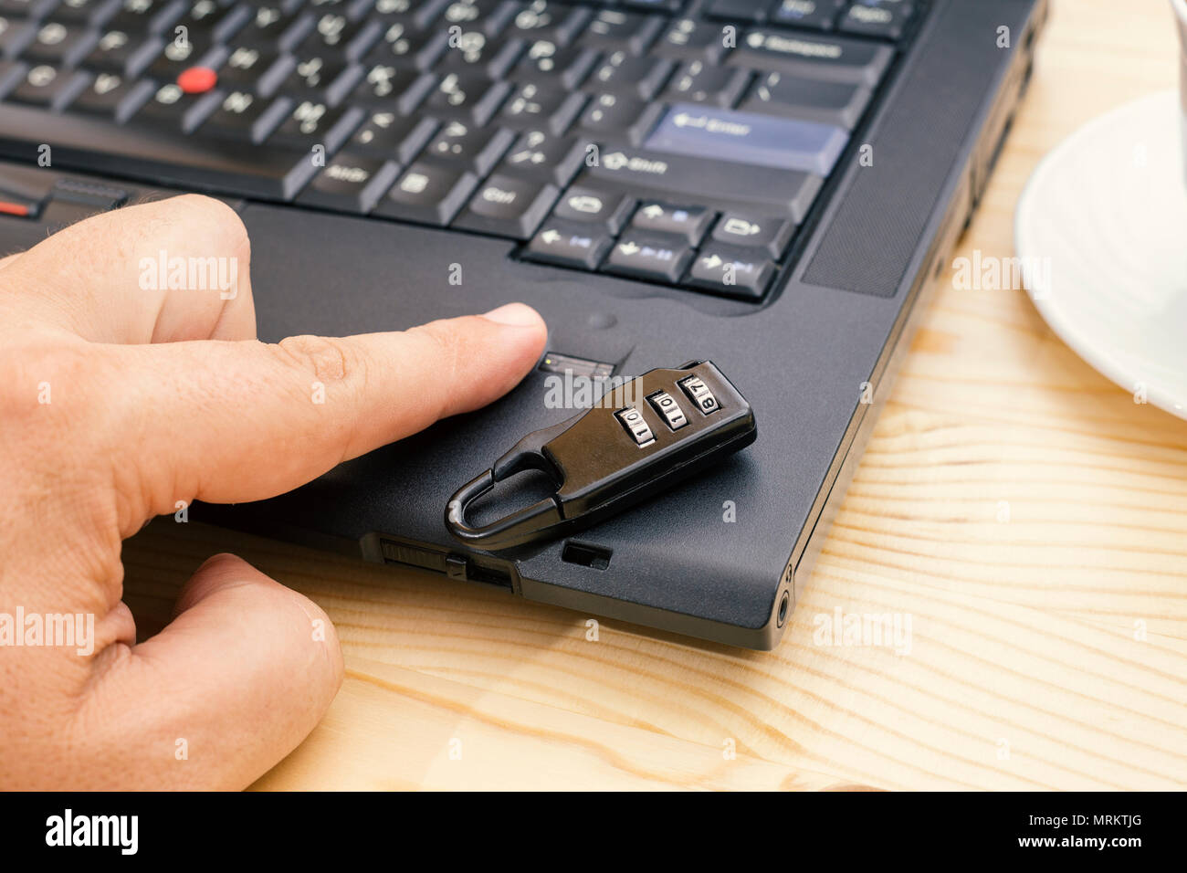 Log in to account security concept. Laptop fingerprint reader and code ...