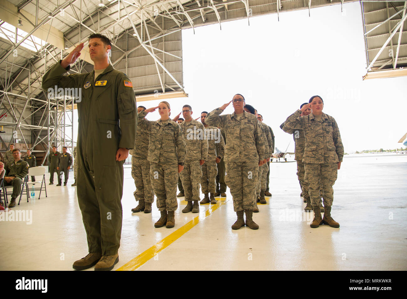 The men and women of the 15th Operations Group give their final salute ...