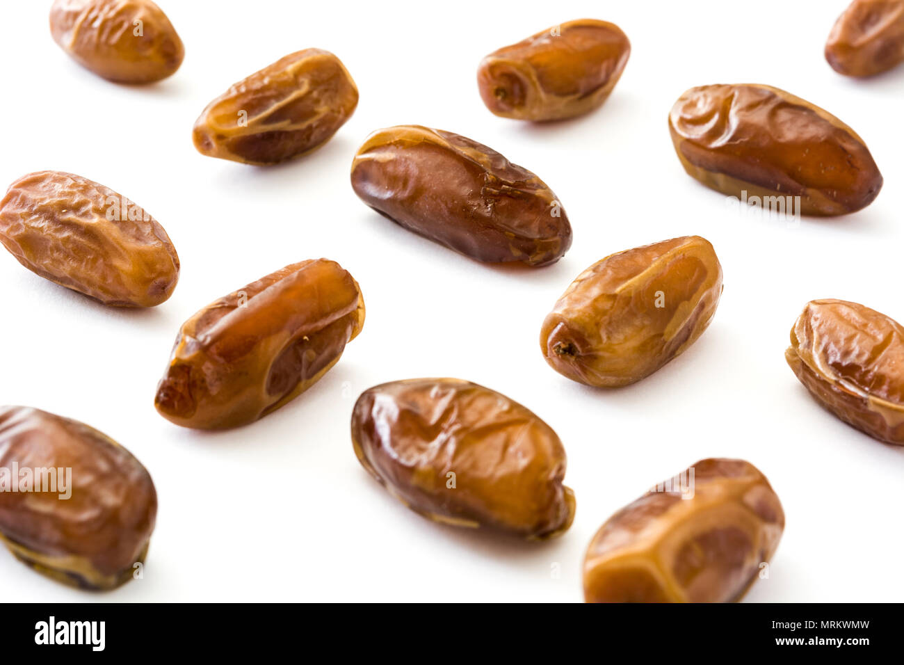 Dates food isolated on white background Stock Photo - Alamy