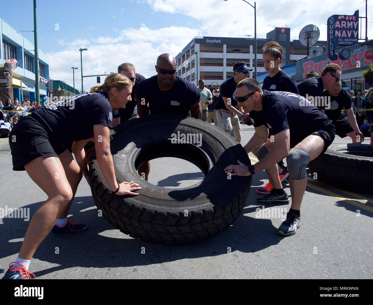 The Alaska Army National Guard team Swole Patrol participates in a tire ...