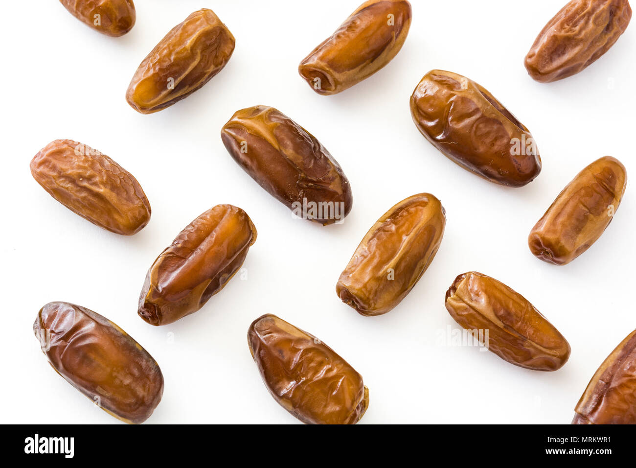 Dates food isolated on white background Stock Photo - Alamy