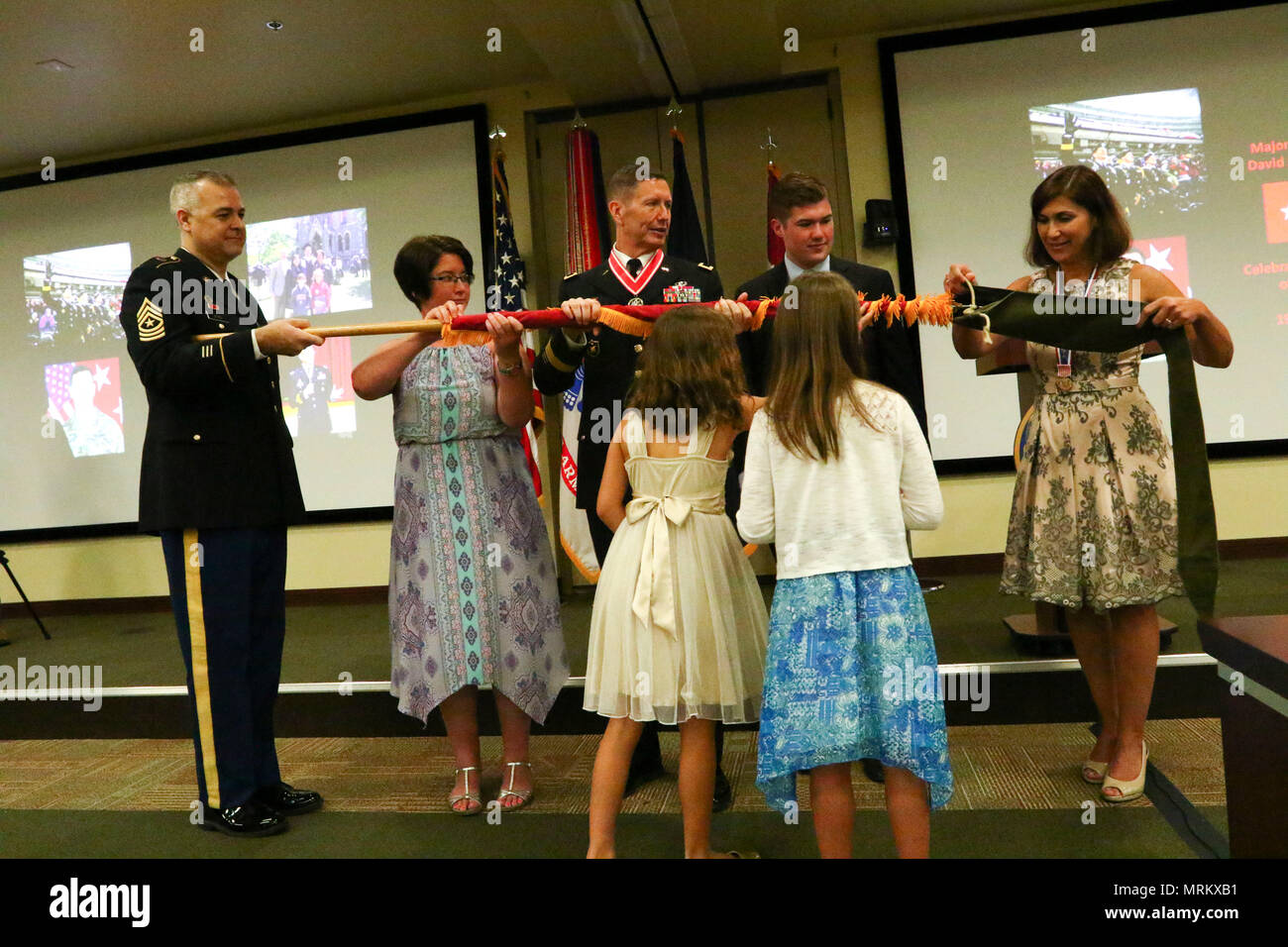 U.S. Army Reserve Maj. Gen. David Conboy and his family case the ...