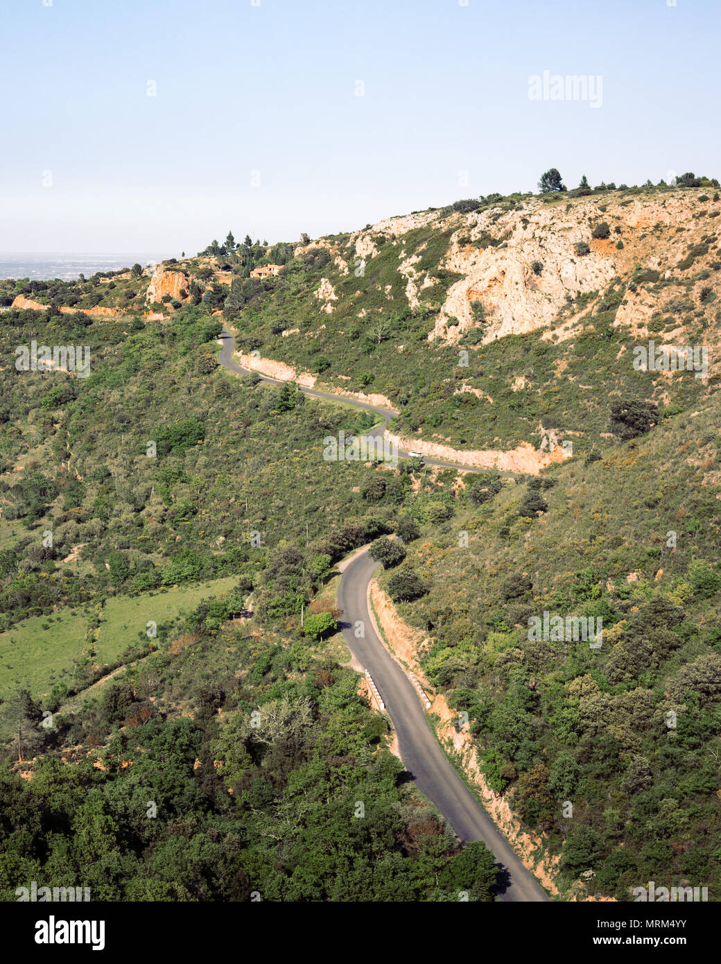 Country road winds through the French countryside Stock Photo - Alamy