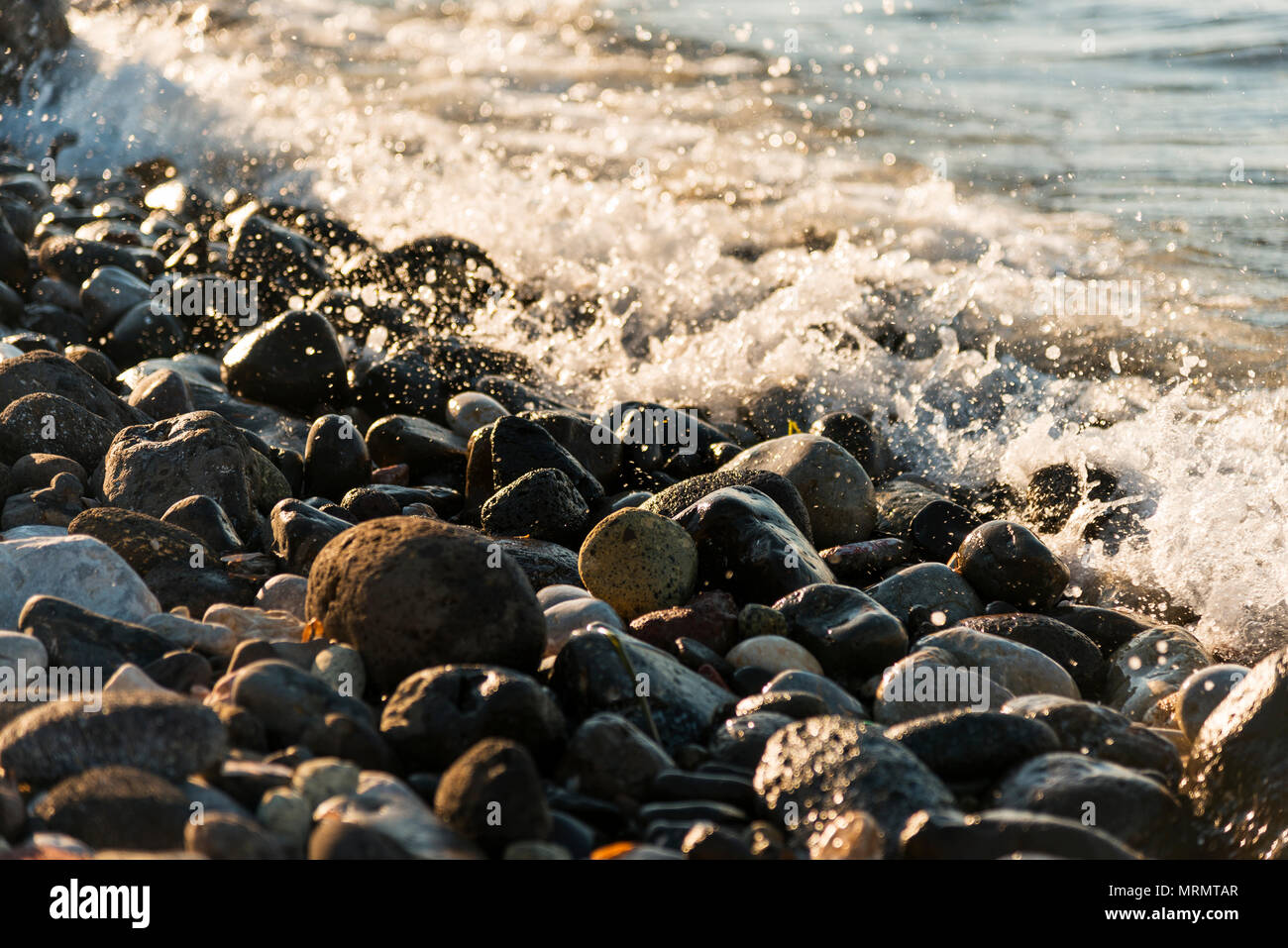 Waves hit stone on shore hi-res stock photography and images - Alamy