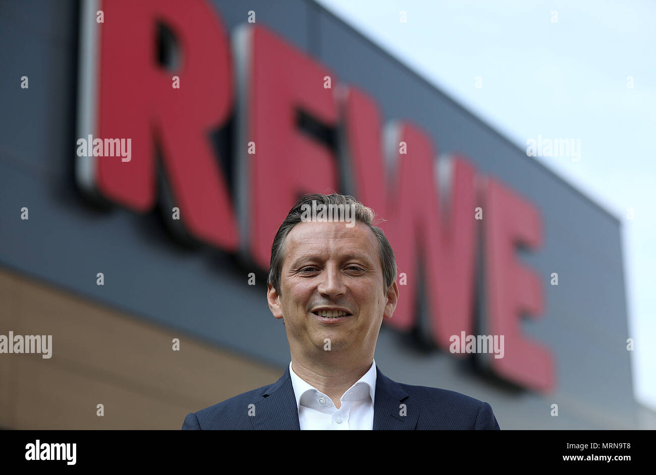 25 May 2018, Germany, Cologne: Lionel Souque, CEO of the Rewe Group ...