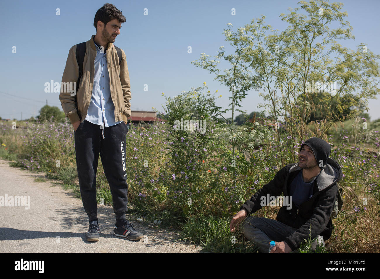 23 May 2018, Greece, Sofiko: Suleiman Khalid, 30, (R), and Adel Ali, 31, (L), both from the ...