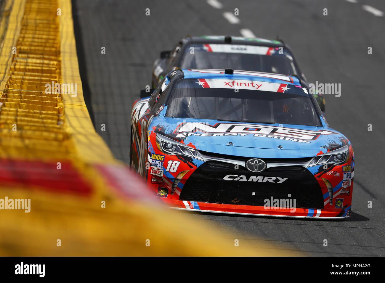 Concord, North Carolina, USA. 26th May, 2018. Kyle Busch (18) brings ...