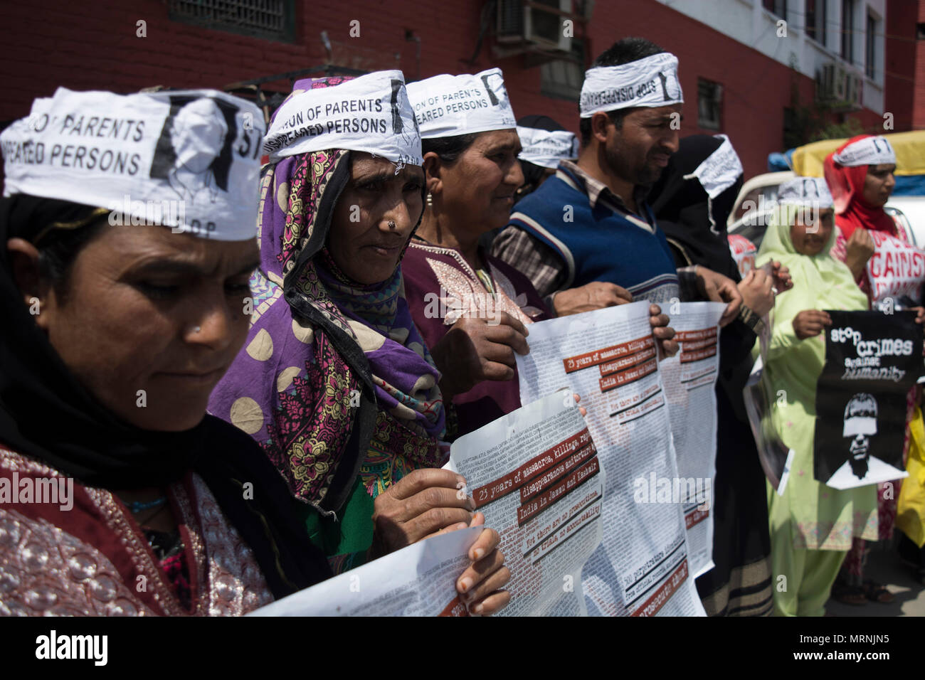 Relatives of disappeared persons take part in a sit-in protest ...