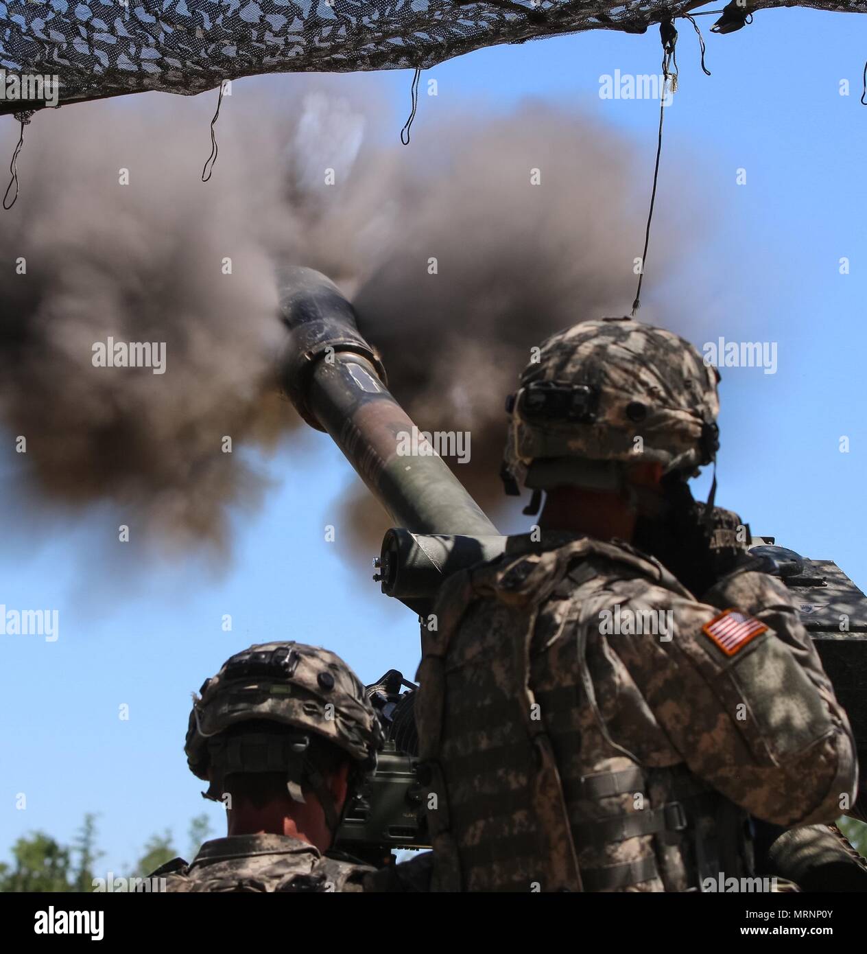 Soldiers from B Battery, 1st Battalion of the 118th Field Artillery ...